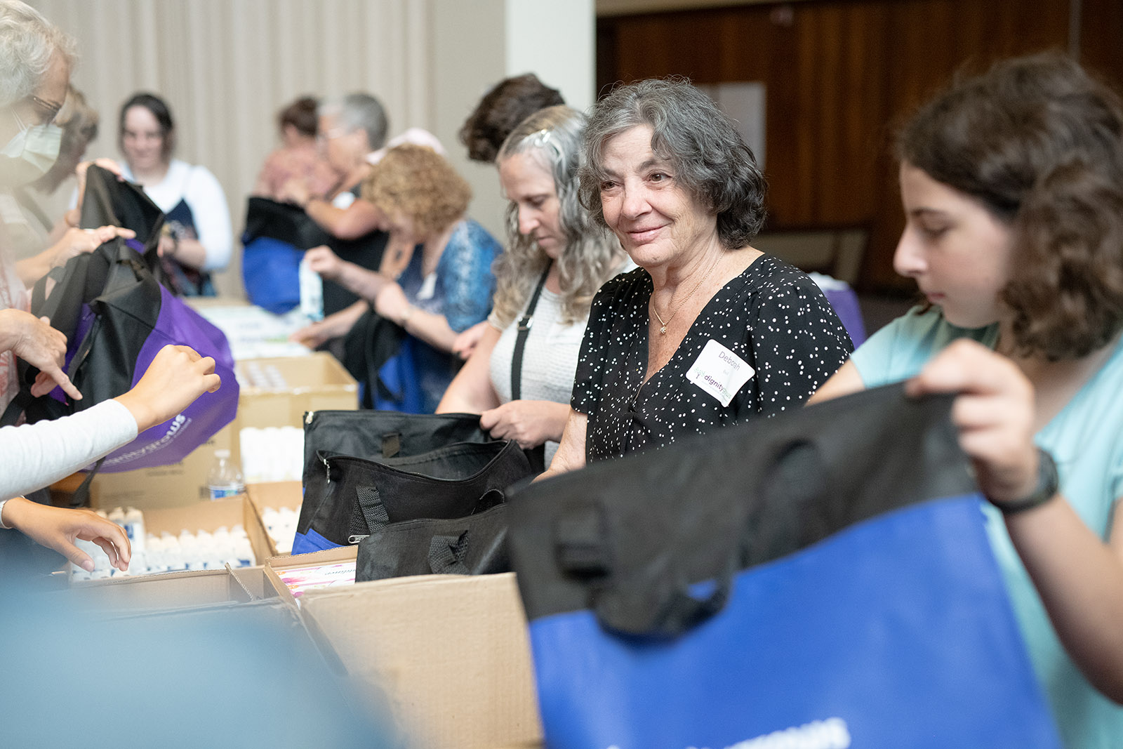 Dignity Grows to start fall with MJCC packing party | Jewish Federation ...